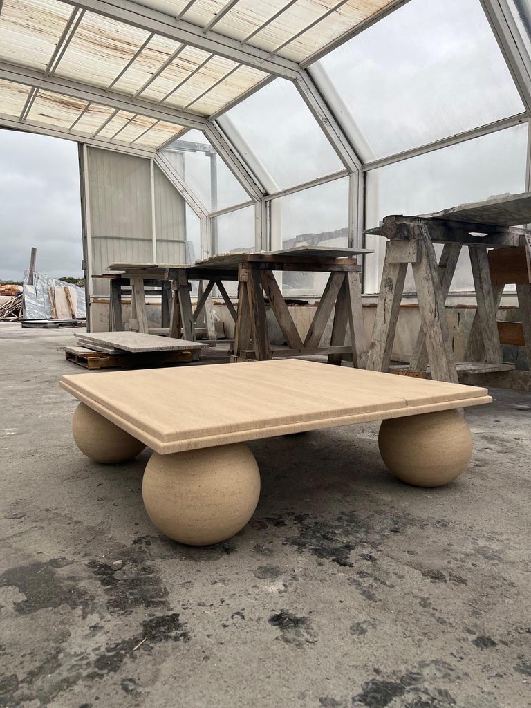 Square stone coffee table with ball sphere base in cream Portuguese ...