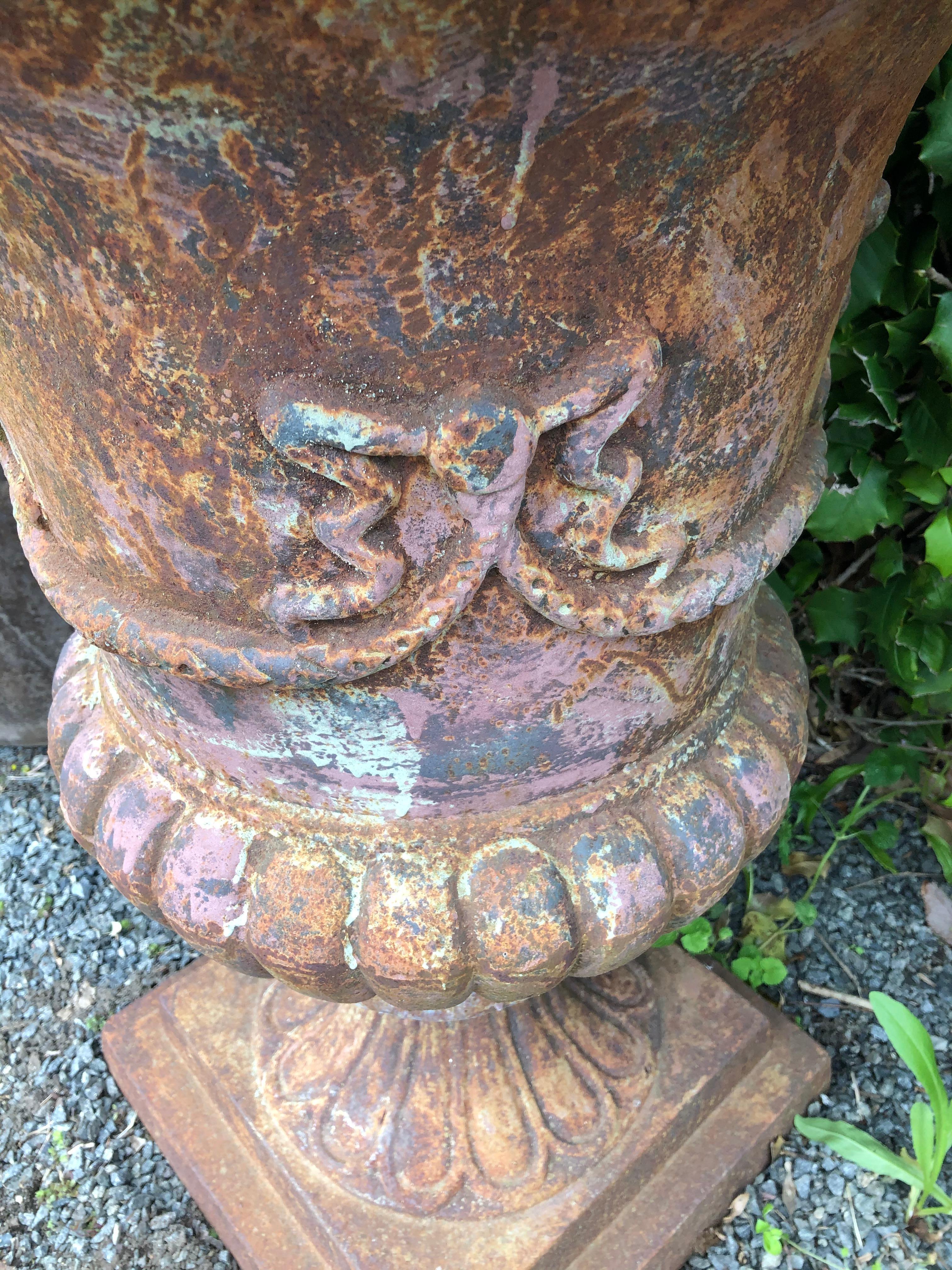 Stately Large Pair of Rust Colored Cast Iron Urn Planters at 1stDibs