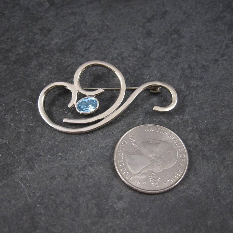 Sterling Blue Rhinestone Swirl Brooch For Sale at 1stDibs
