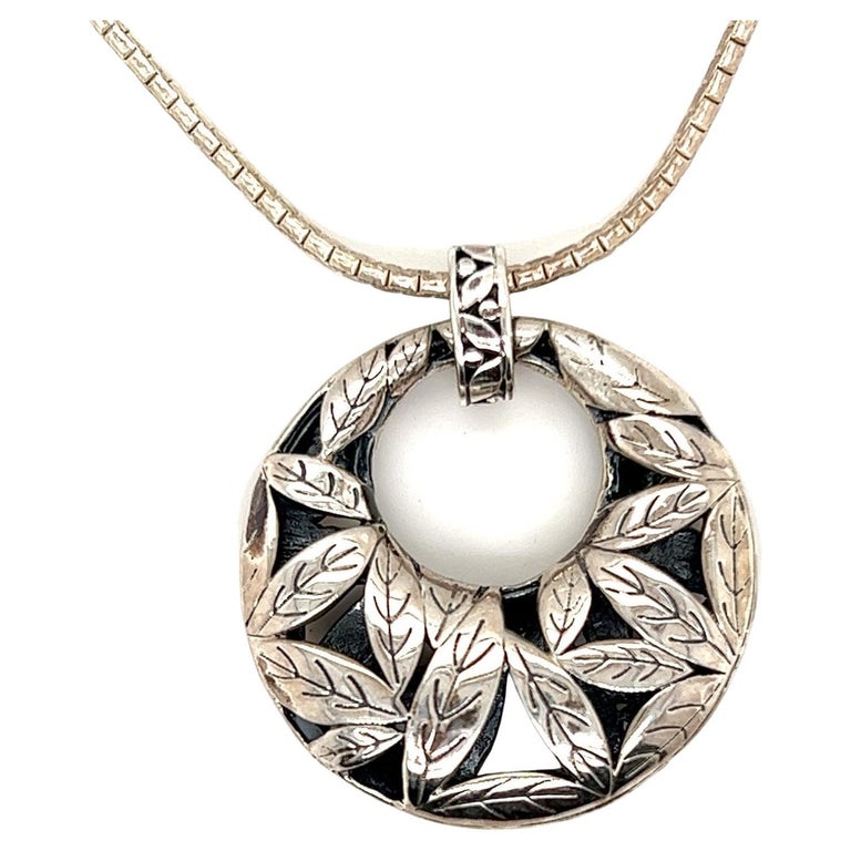Sterling Silver Circular Bamboo motif pendant For Sale at 1stDibs