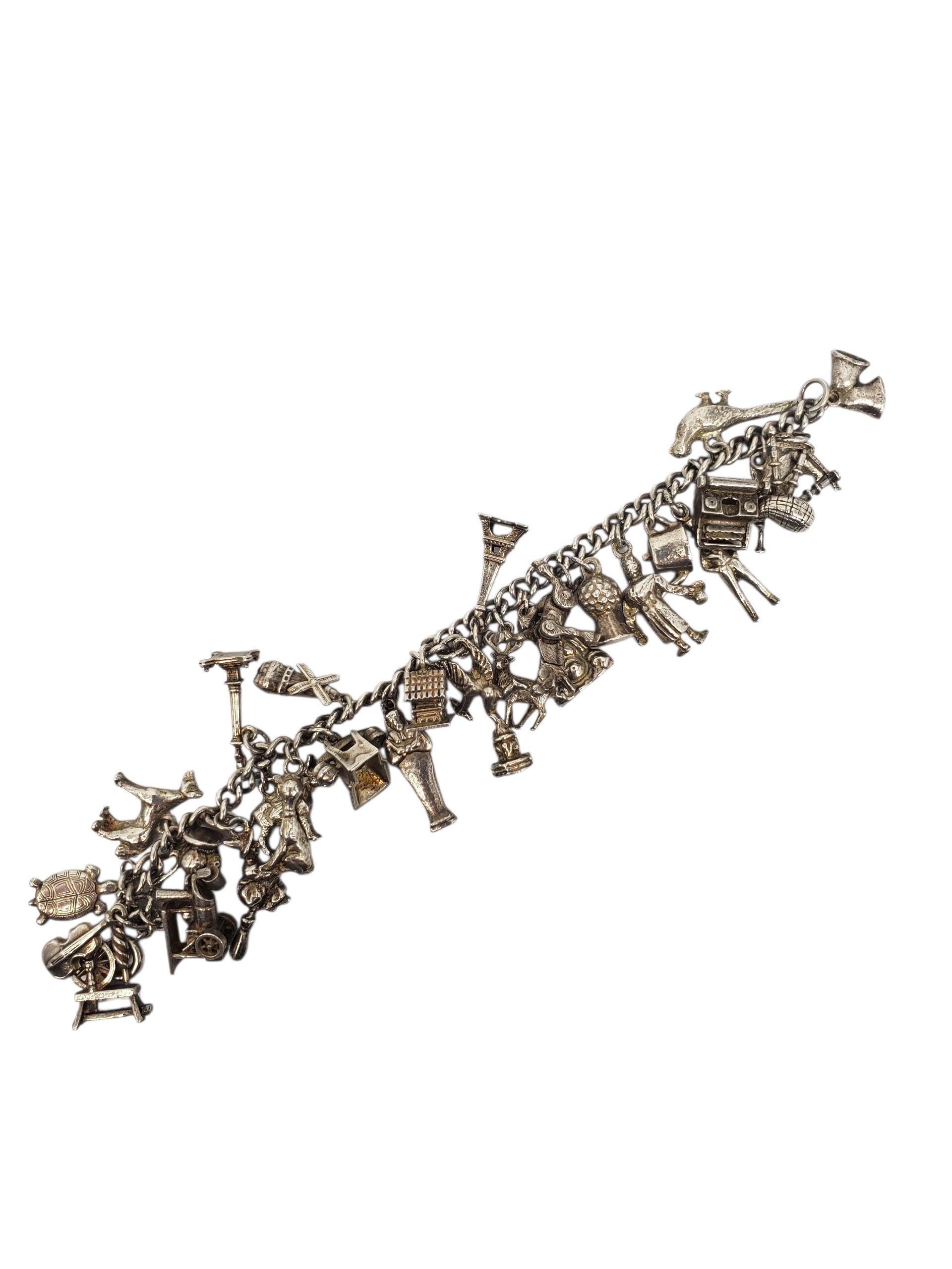 Sterling Silver Multiple Charms Bracelet #24483 For Sale at 1stDibs