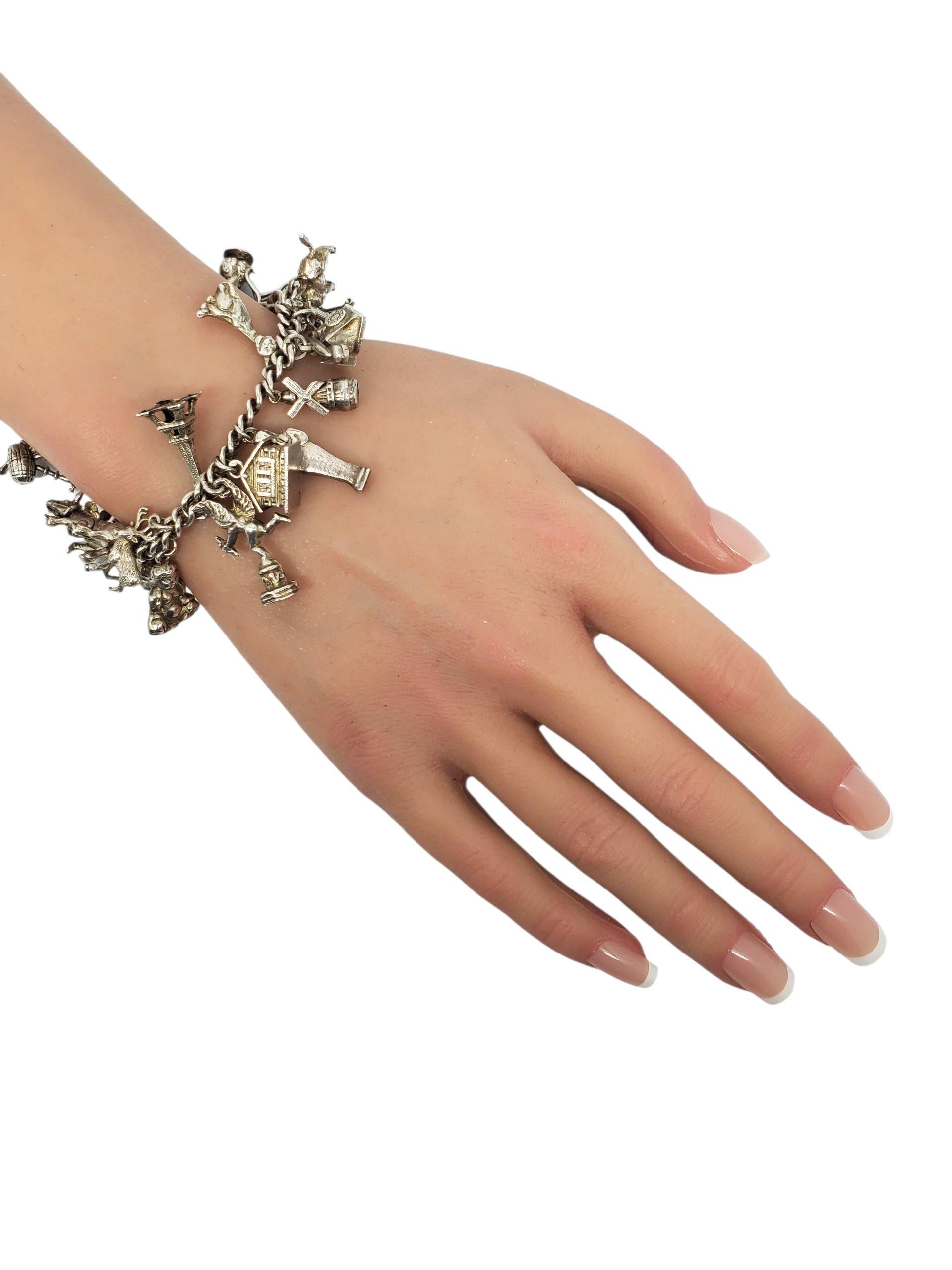 Sterling Silver Multiple Charms Bracelet #24483 For Sale at 1stDibs