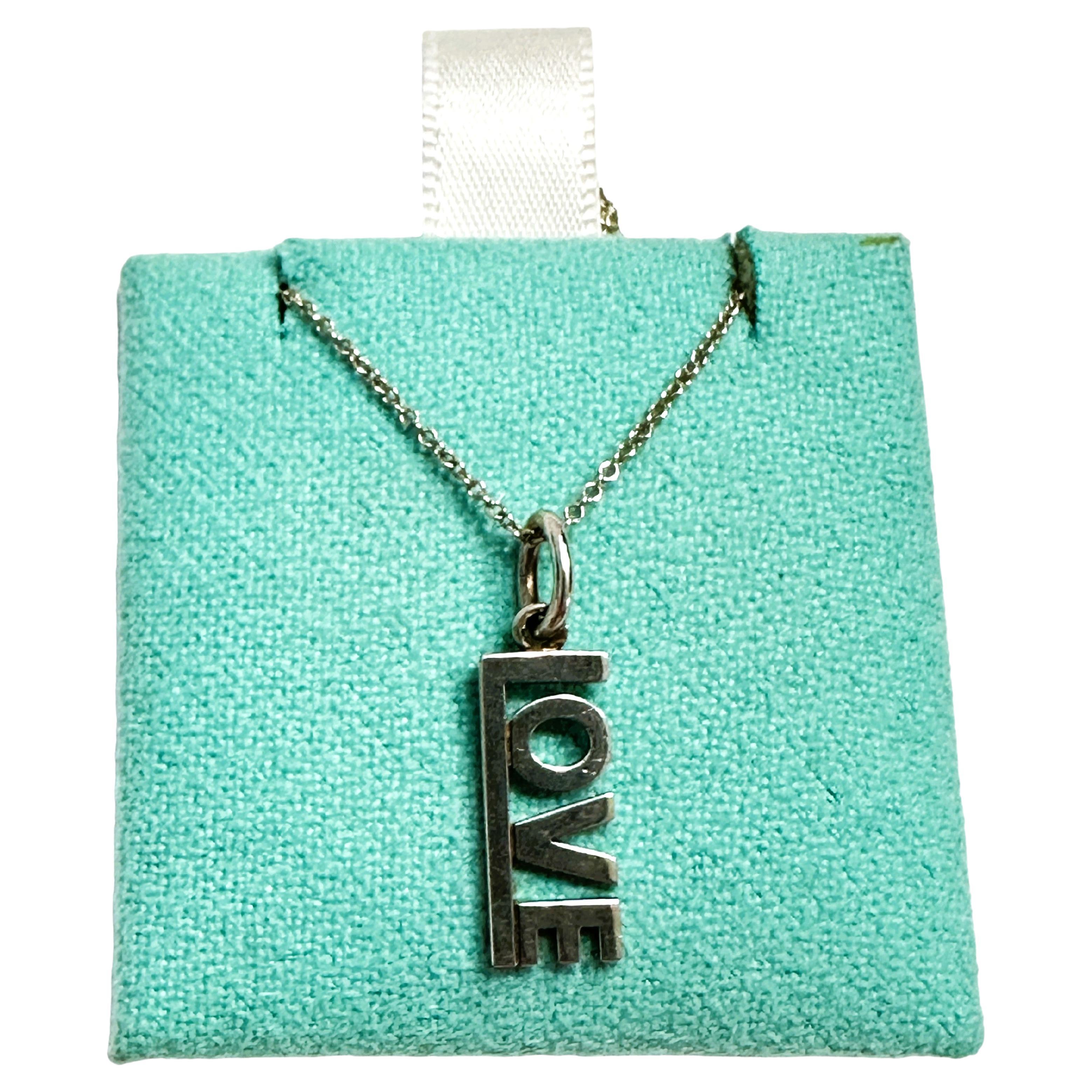 Tiffany and Co. T Small Smile Pendant Necklace in Sterling Silver at ...