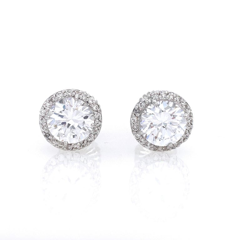 Stunning 4ct Simulated Diamond Halo Stud Earrings For Sale at 1stDibs