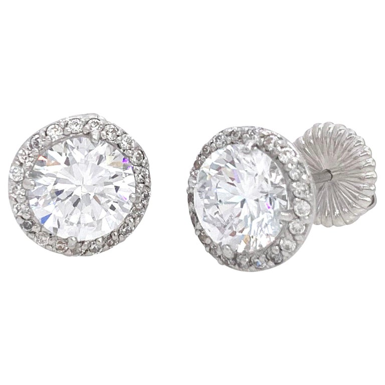 Stunning 4ct Simulated Diamond Halo Stud Earrings For Sale at 1stDibs