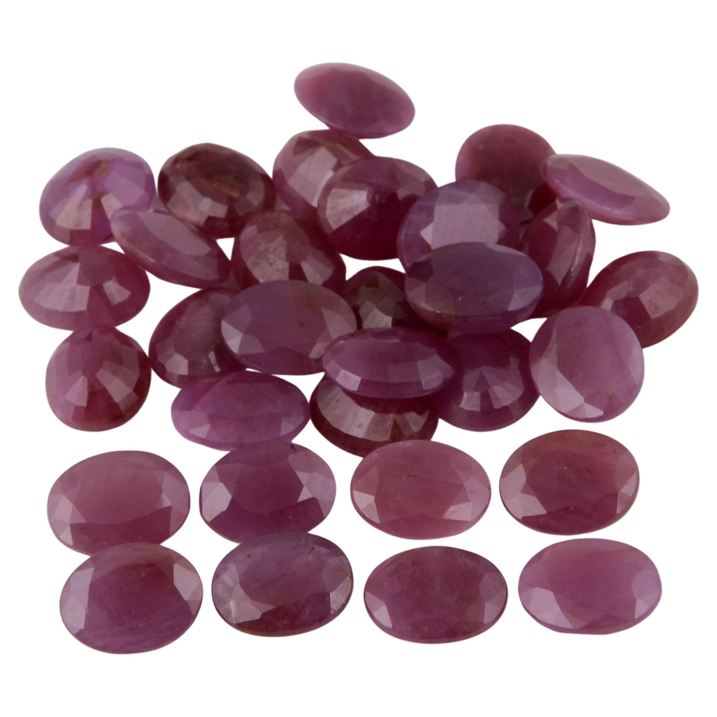 Stunning 89.1 Carat Oval Natural Ruby with 31 Pieces For Sale at 1stDibs