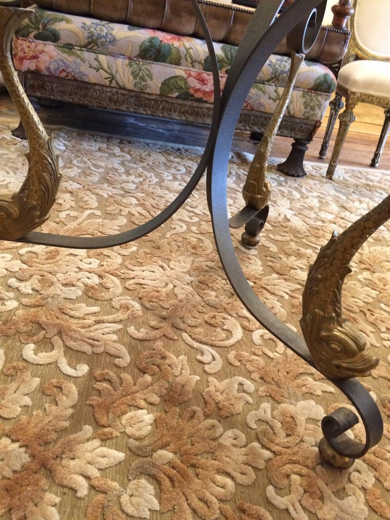 Stunning Iron and Gilded Fish Motife Round Glass Top Table at 1stDibs