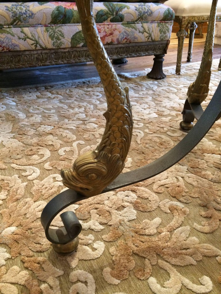 Stunning Iron and Gilded Fish Motife Round Glass Top Table at 1stDibs