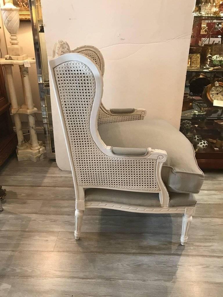 Stylish Pair of Louis XVI Style Painted Walnut and Cane Wing Chairs at ...