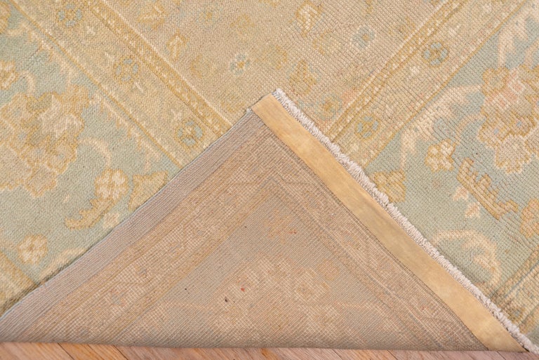 Subdued Antique Oushak Carpet, circa 1910s For Sale at 1stDibs