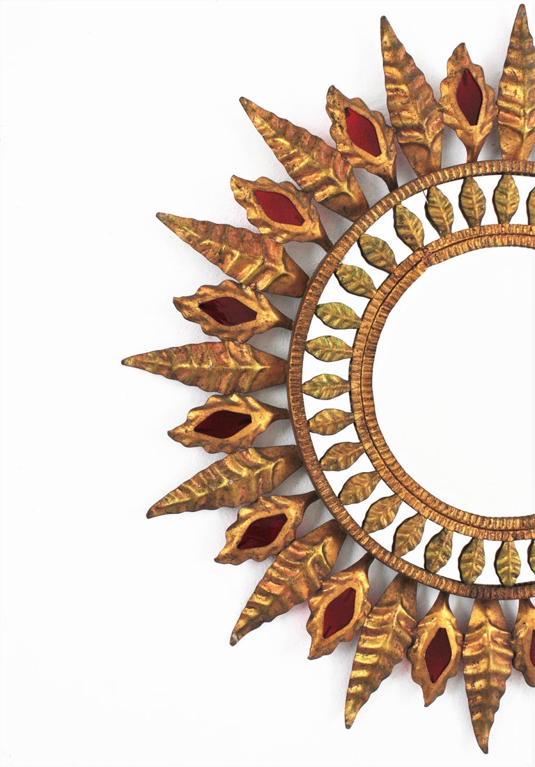 Sunburst Mirror with Red Glass Details in Gilt Iron, Hollywood Regency ...