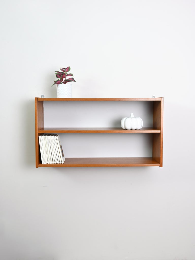 Suspended teak wood bookcase For Sale at 1stDibs