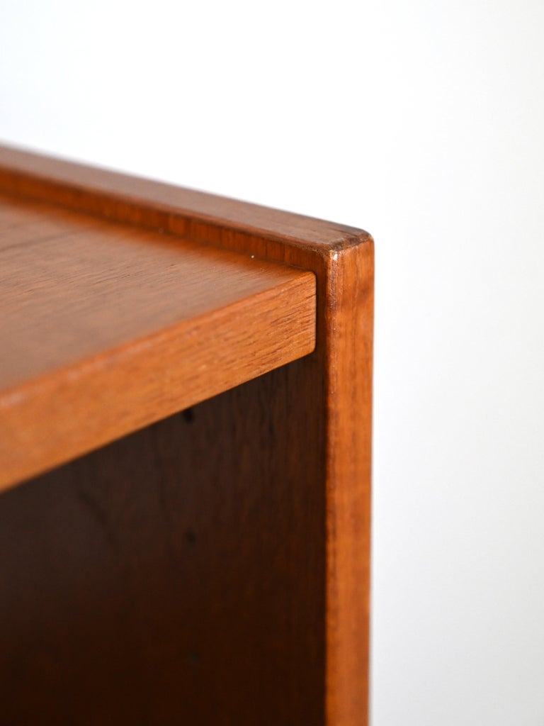 Suspended teak wood bookcase For Sale at 1stDibs