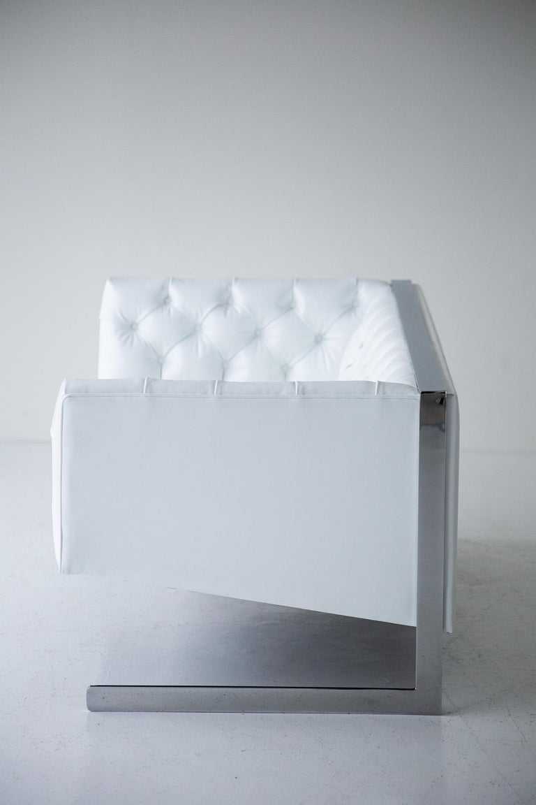 Swanky Mid-Century Modern Chrome and Leather Tufted Sofa For Sale at 1stDibs