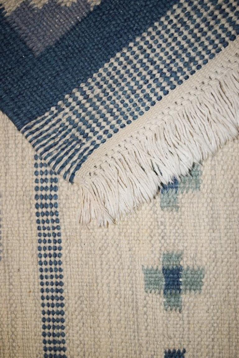 Swedish handwoven wool rug with fringes in the 