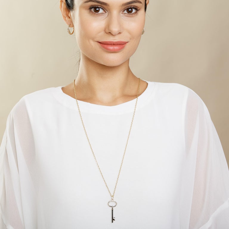 Syna Yellow Gold and Oxidized Silver Key Pendant with Champagne ...