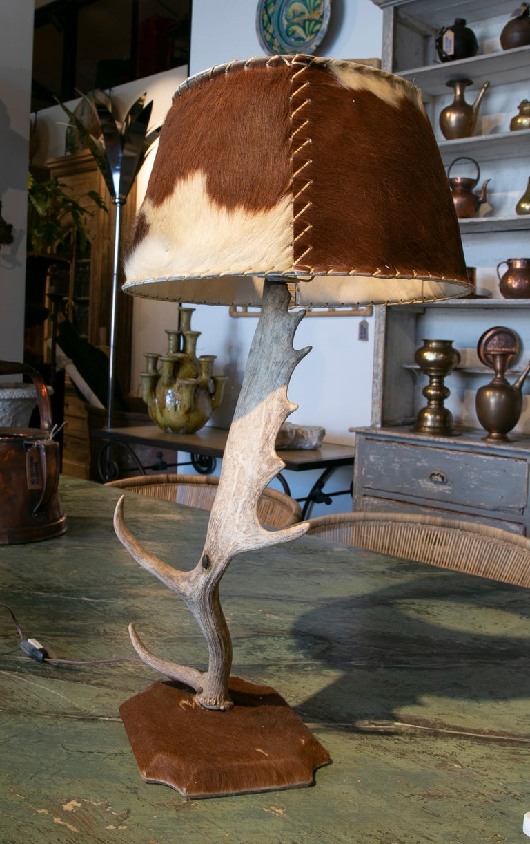 Table Lamp Made With An Antler And Deer Leather Used For The Base And