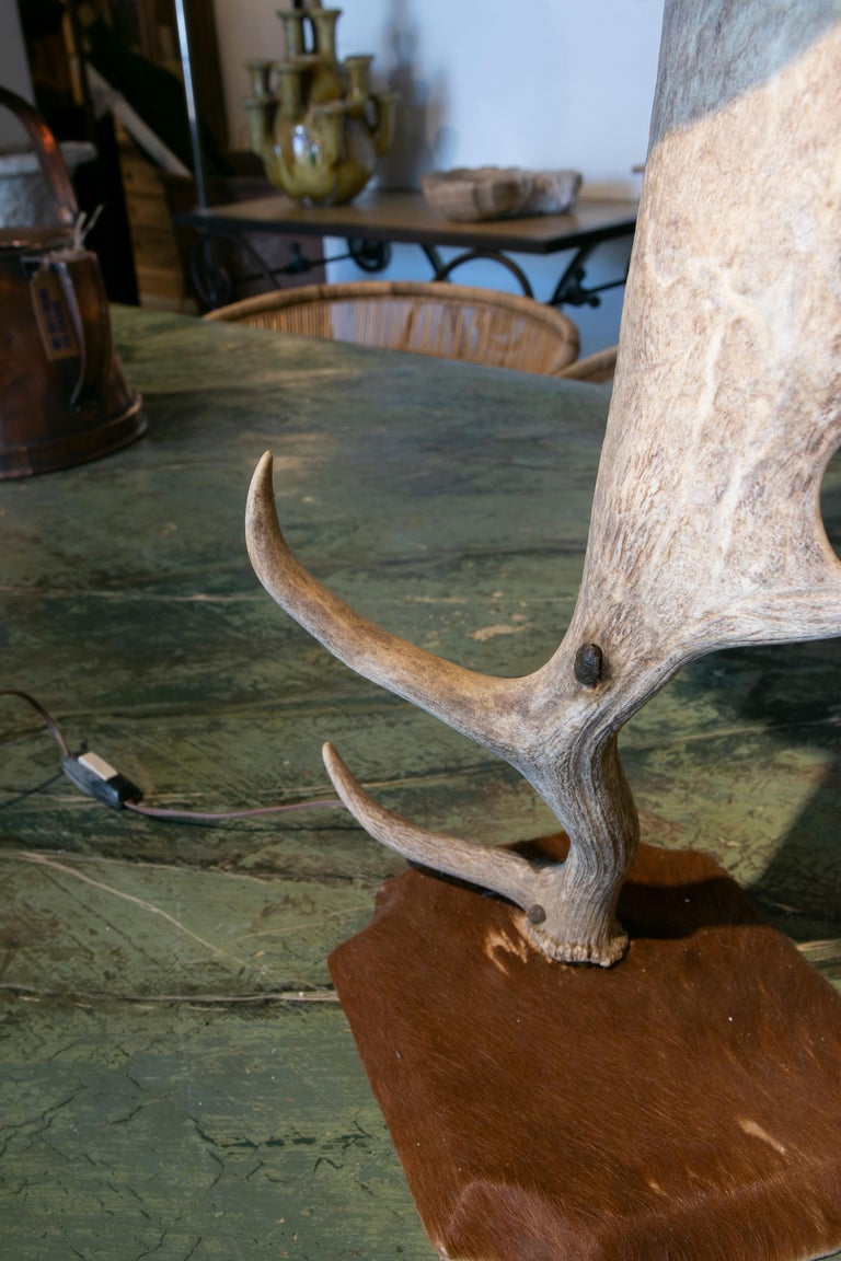 Table Lamp Made With An Antler And Deer Leather Used For The Base And