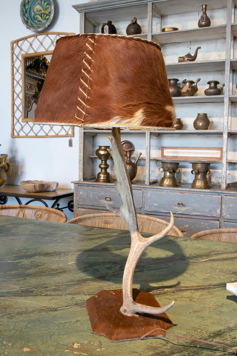 Table Lamp Made With An Antler And Deer Leather Used For The Base And