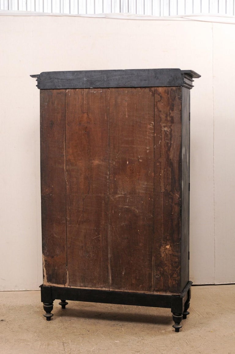 Tall Mid-20th Century British Colonial Ebonized Wood Cabinet at 1stDibs