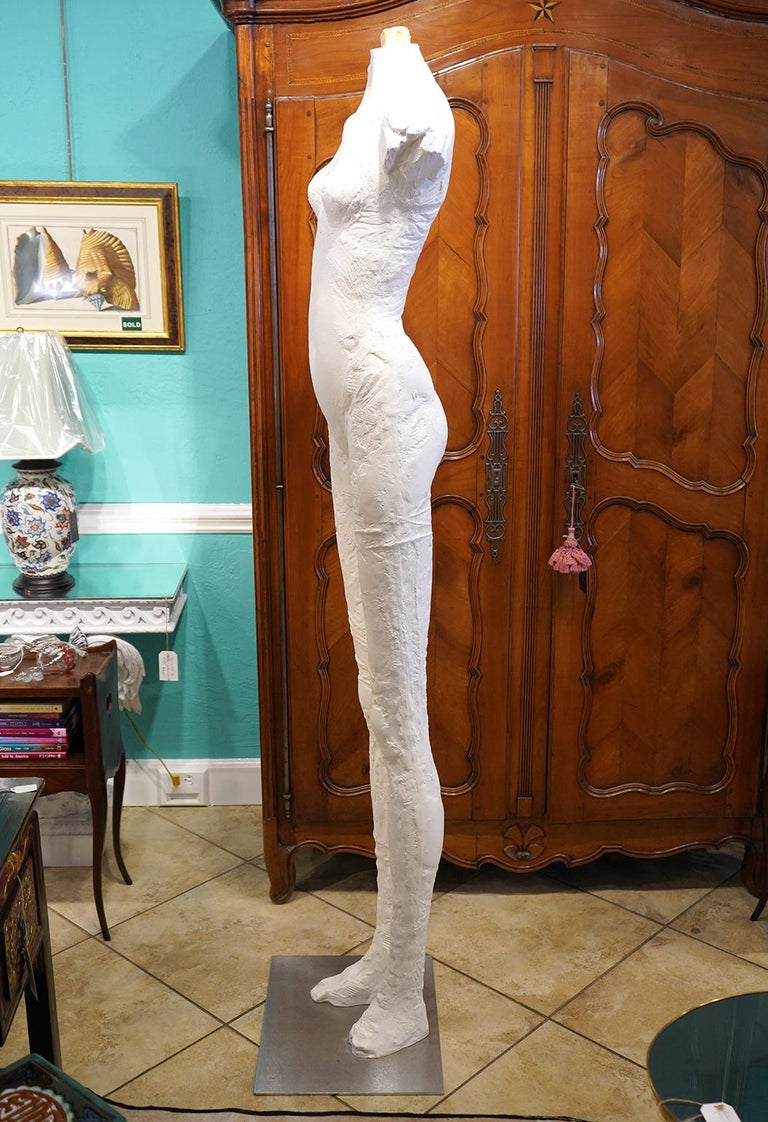 Tall Textured Sculpture of a Woman with Exaggerated Legs Style of ...