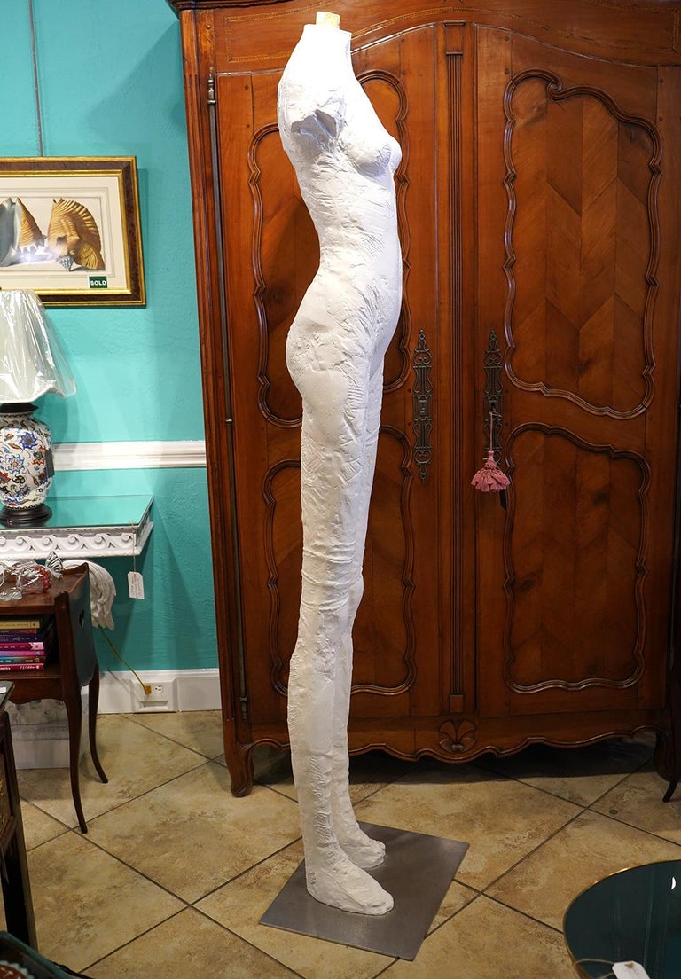 Tall Textured Sculpture of a Woman with Exaggerated Legs Style of ...