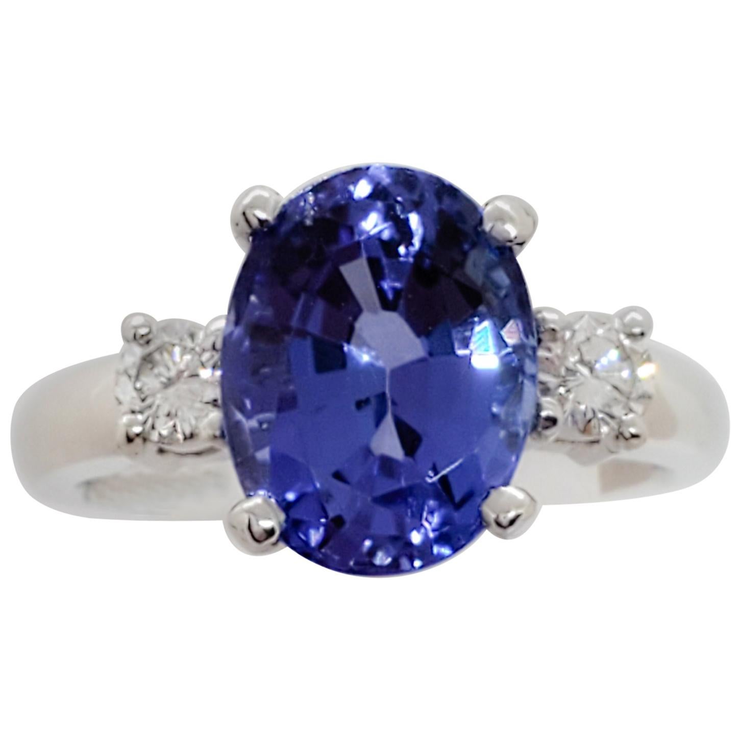 Tanzanite Oval and Diamond Baguette Cocktail Ring in Platinum at 1stDibs