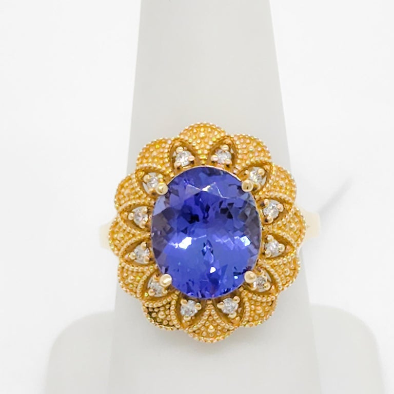 Tanzanite Oval and White Diamond Round Cluster Ring in 14k Yellow Gold ...