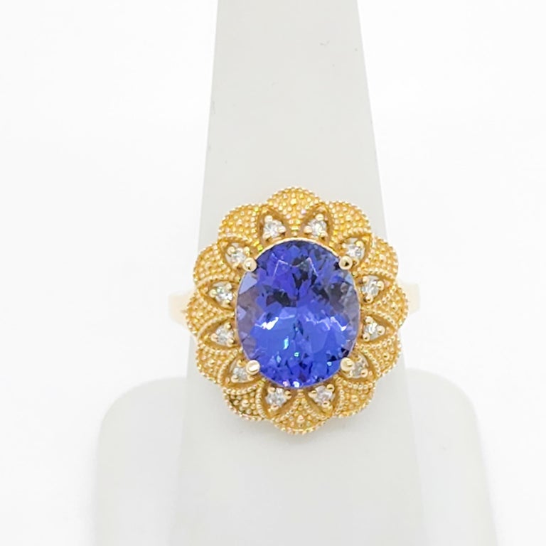 Tanzanite Oval and White Diamond Round Cluster Ring in 14k Yellow Gold ...