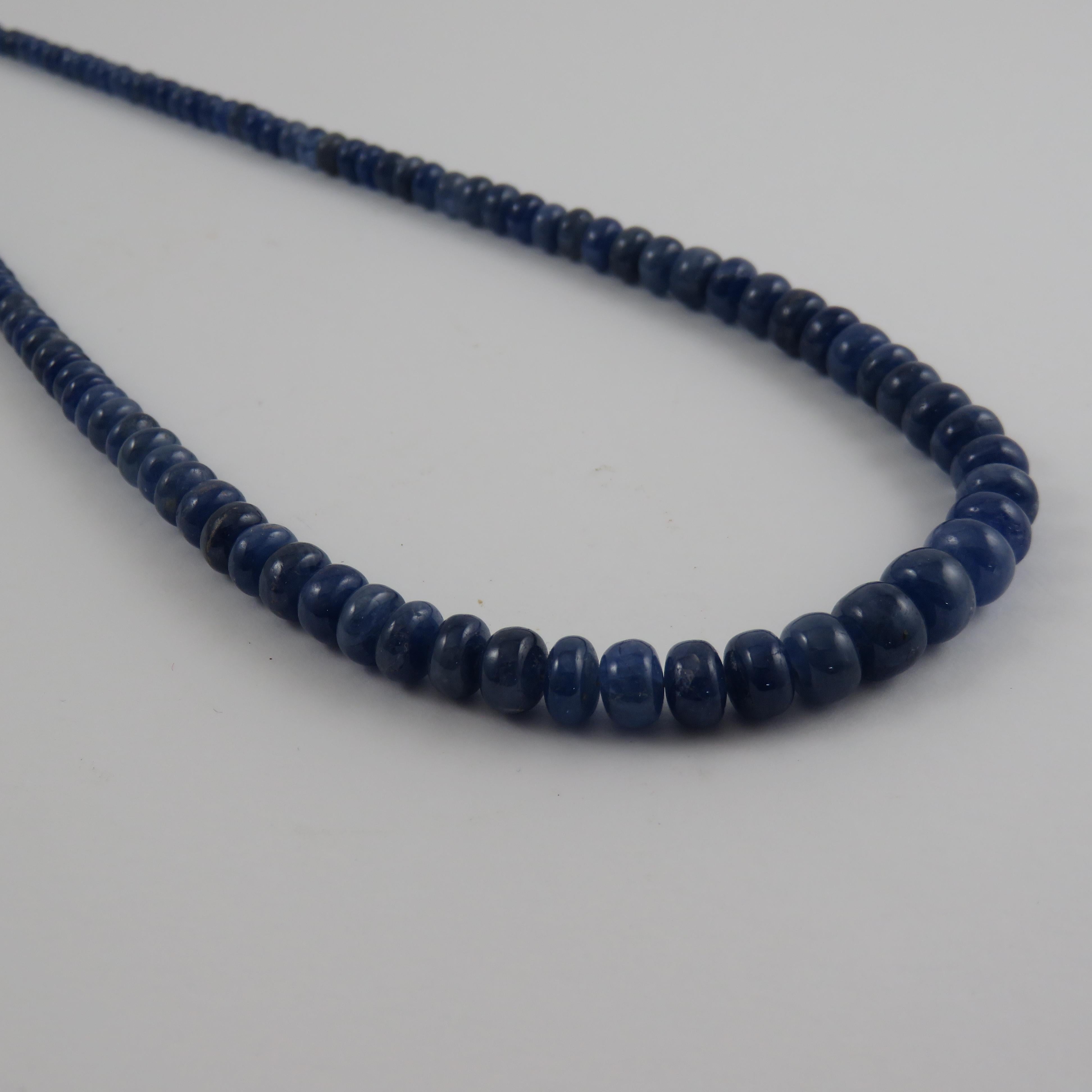Tapered Sapphire Bead Necklace with 9 Karat Gold Clasp at 1stDibs