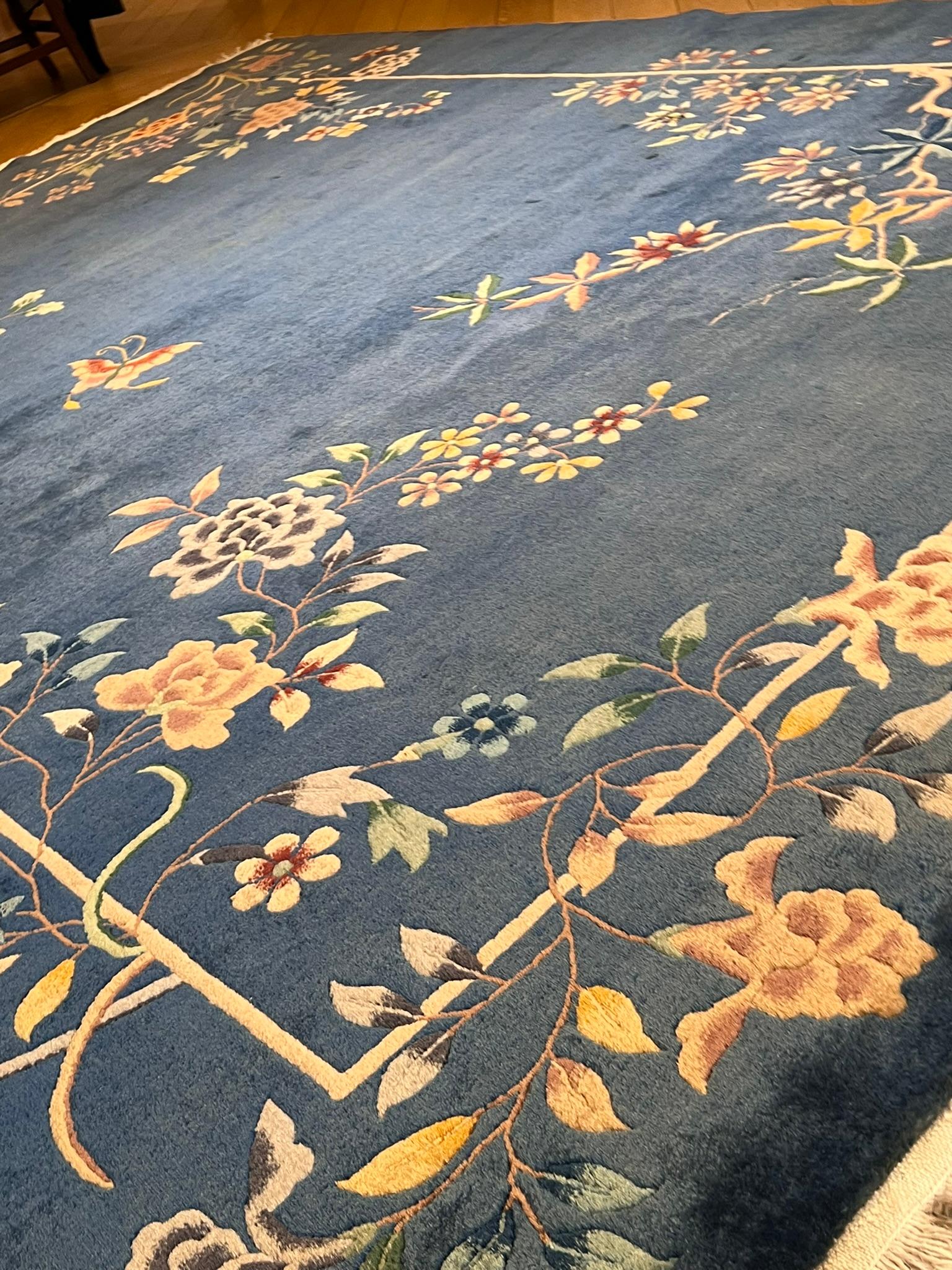 Art Deco rug light blue background with a butterfly and cascades of ...