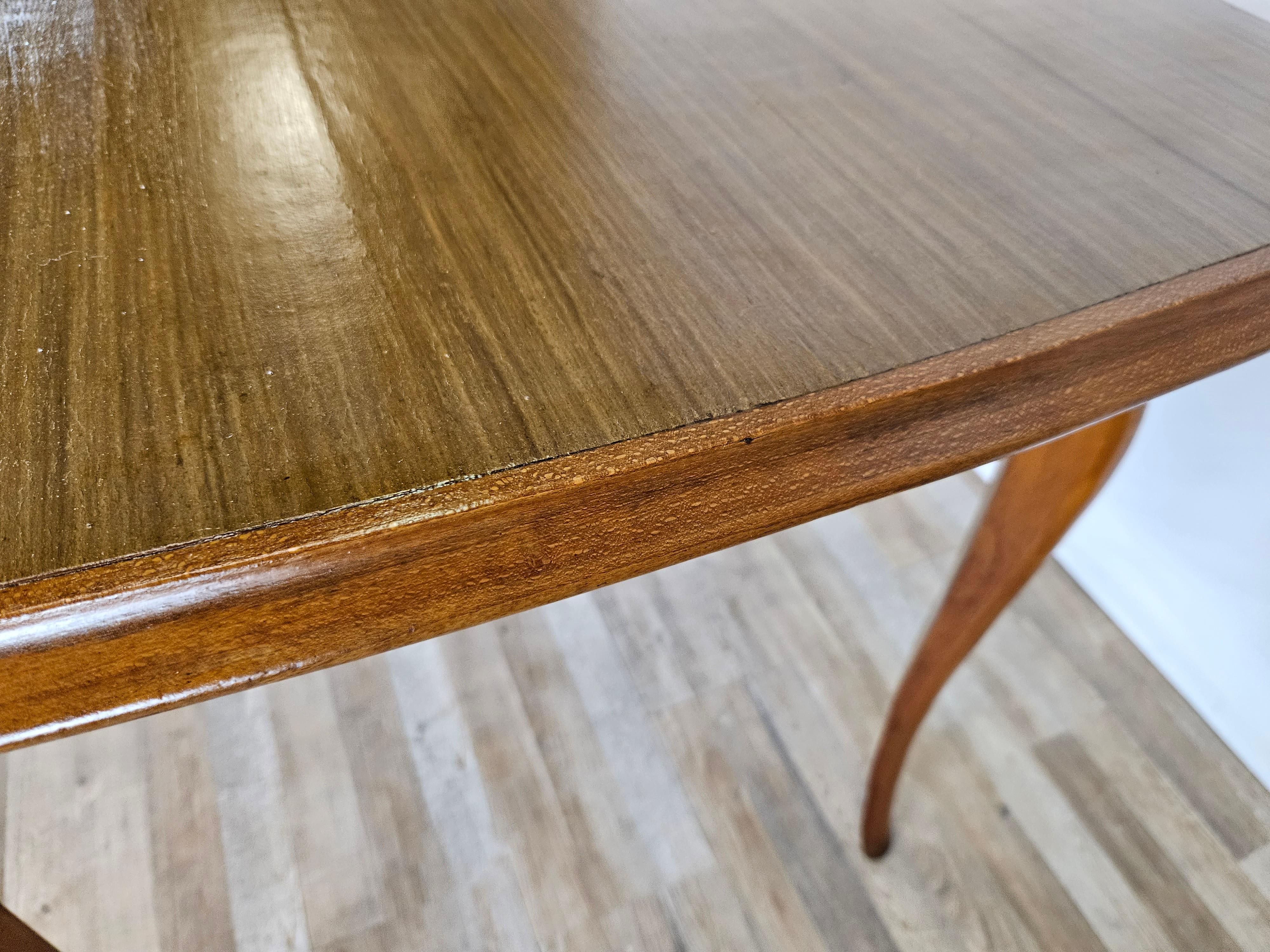 Walnut-stained beech dining table with drawer and wavy legs For Sale at ...