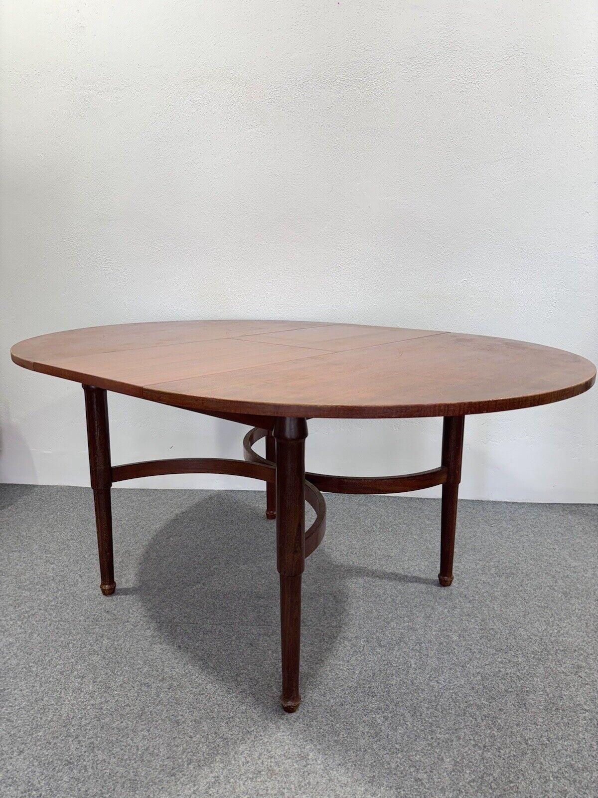 Extendable oval teak dining table Modern design 1970's For Sale at 1stDibs