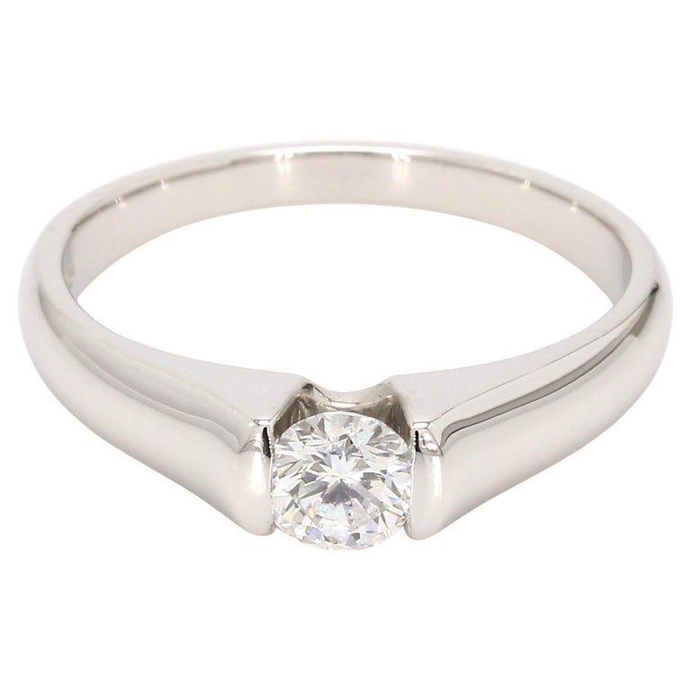 Tension Set Solitaire Diamond and Platinum Engagement Ring For Sale at ...