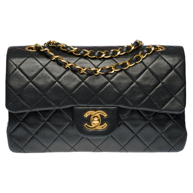 The Coveted Chanel Timeless 23cm Shoulder bag in black quilted lambskin ...