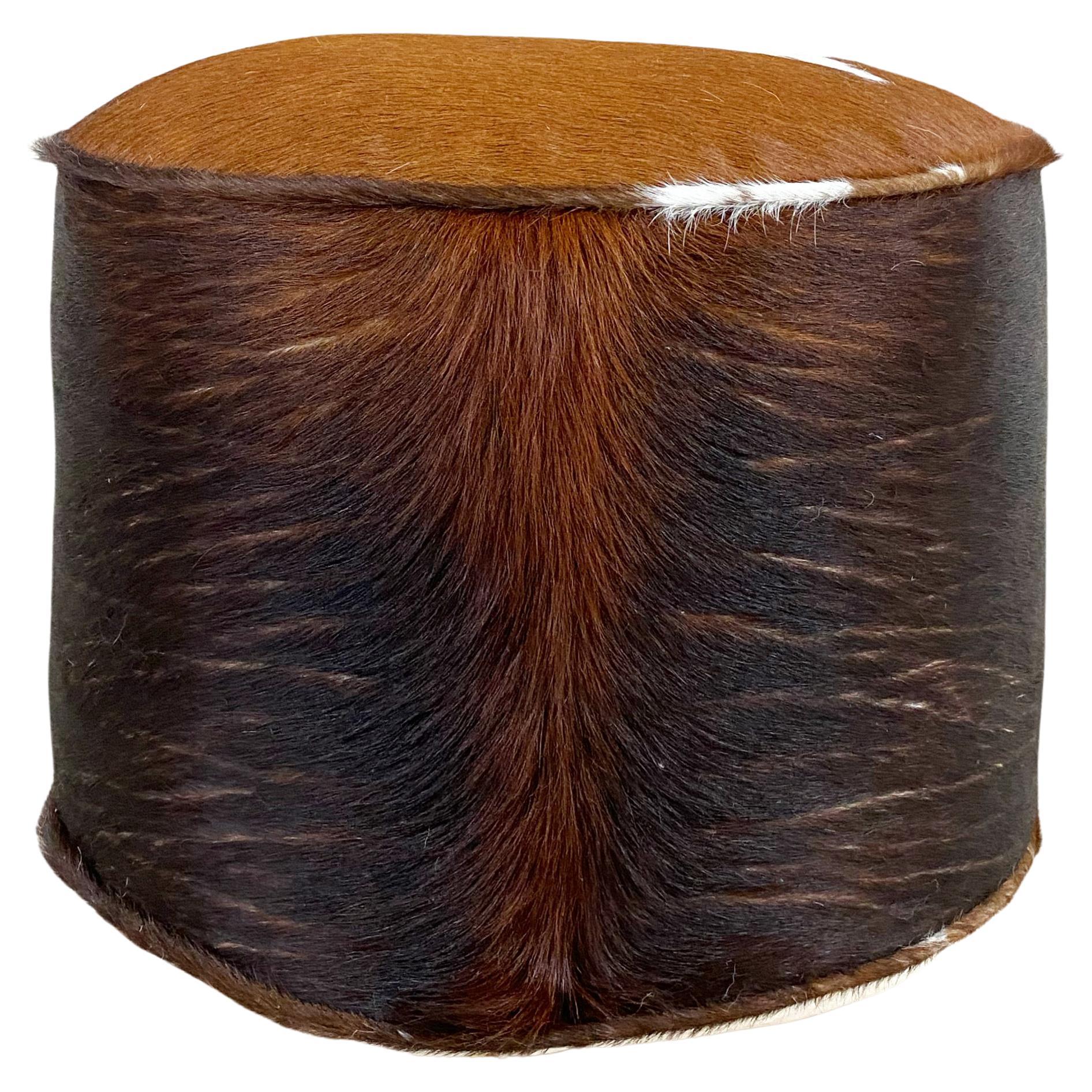 Black Cowhide Pouf Ottoman For Sale at 1stDibs