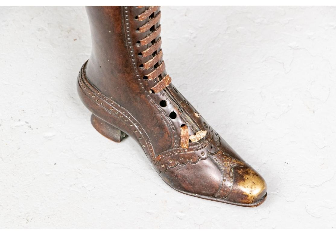 Theodore Alexander Tooled Leather Top Cocktail Table With Boot Form ...