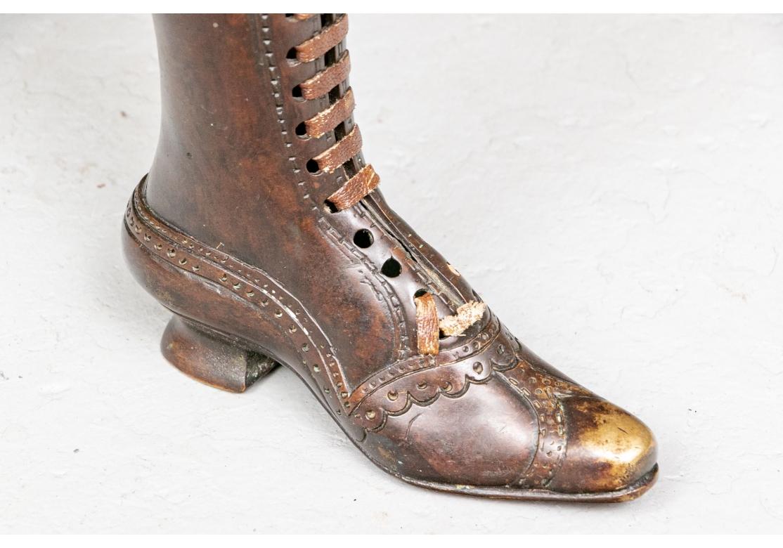 Theodore Alexander Tooled Leather Top Cocktail Table With Boot Form ...