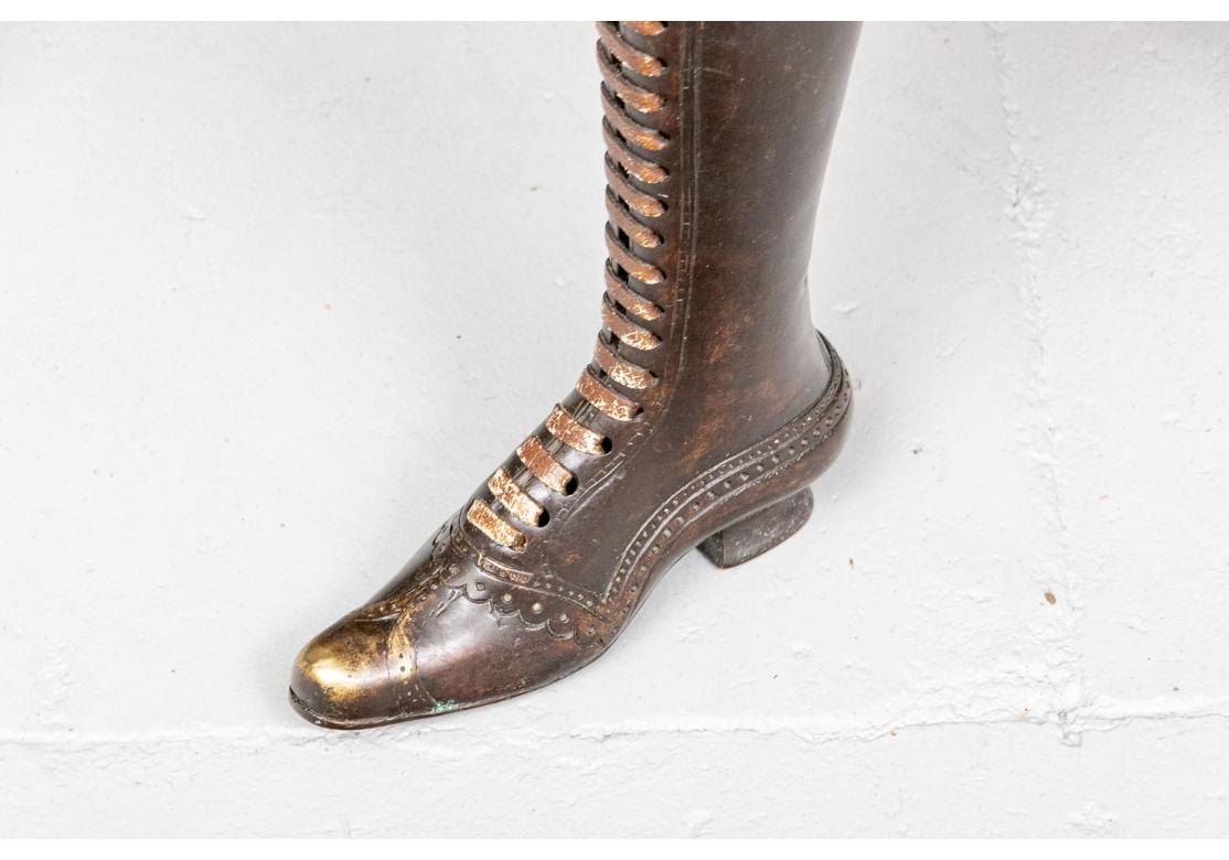 Theodore Alexander Tooled Leather Top Cocktail Table With Boot Form ...