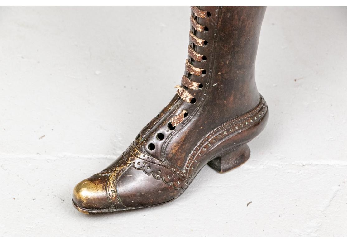 Theodore Alexander Tooled Leather Top Cocktail Table With Boot Form ...