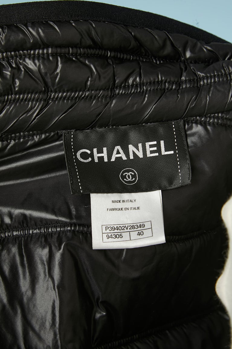 Thin padded black nylon jacket with zip in the middle front Chanel For ...
