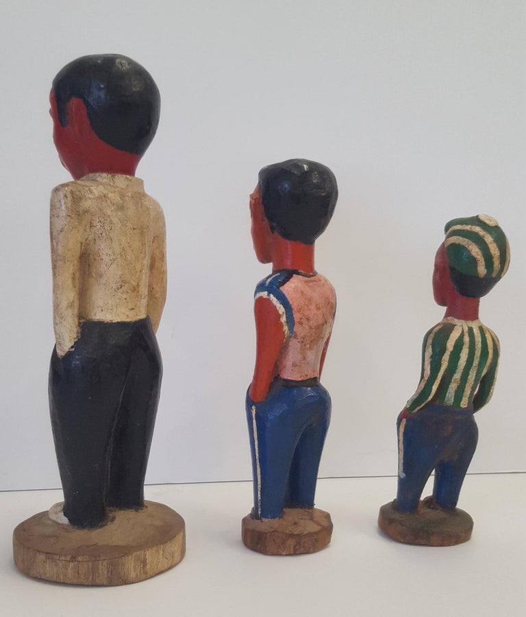 Three 20th Century, Wooden Ivory Coast Colonial Male Figures at 1stDibs