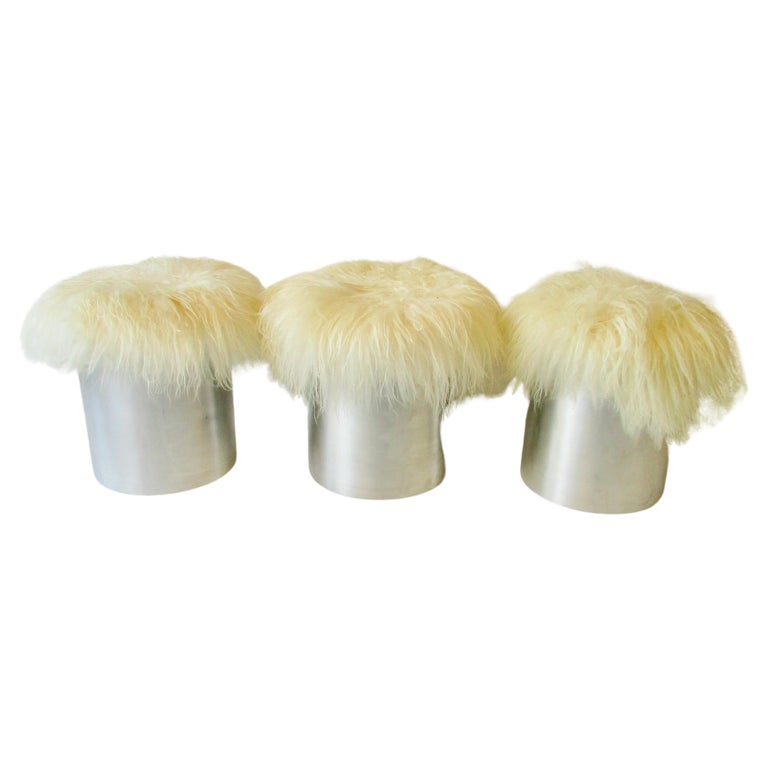 Three Aluminium cylinder base Mongolian curly Lamb hide pouffes or ...