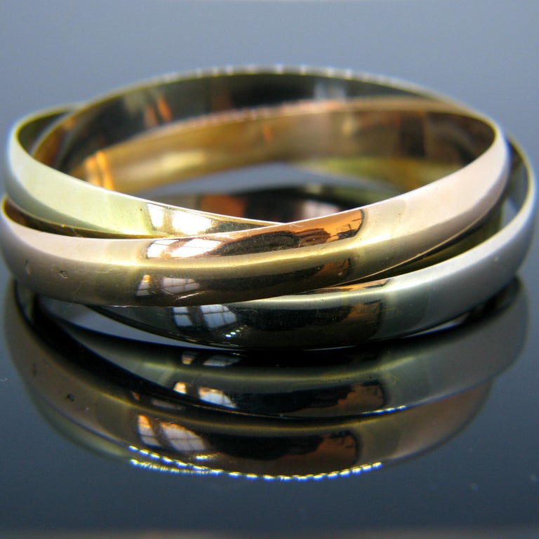 Three-Color Gold Rolling Bangle, 18kt Gold For Sale at 1stDibs