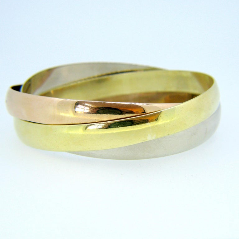 Three-Color Gold Rolling Bangle, 18kt Gold For Sale at 1stDibs