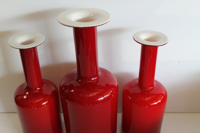 Three Red Bottles by Otto Bauer for Holmegaard, Denmark For Sale at 1stDibs
