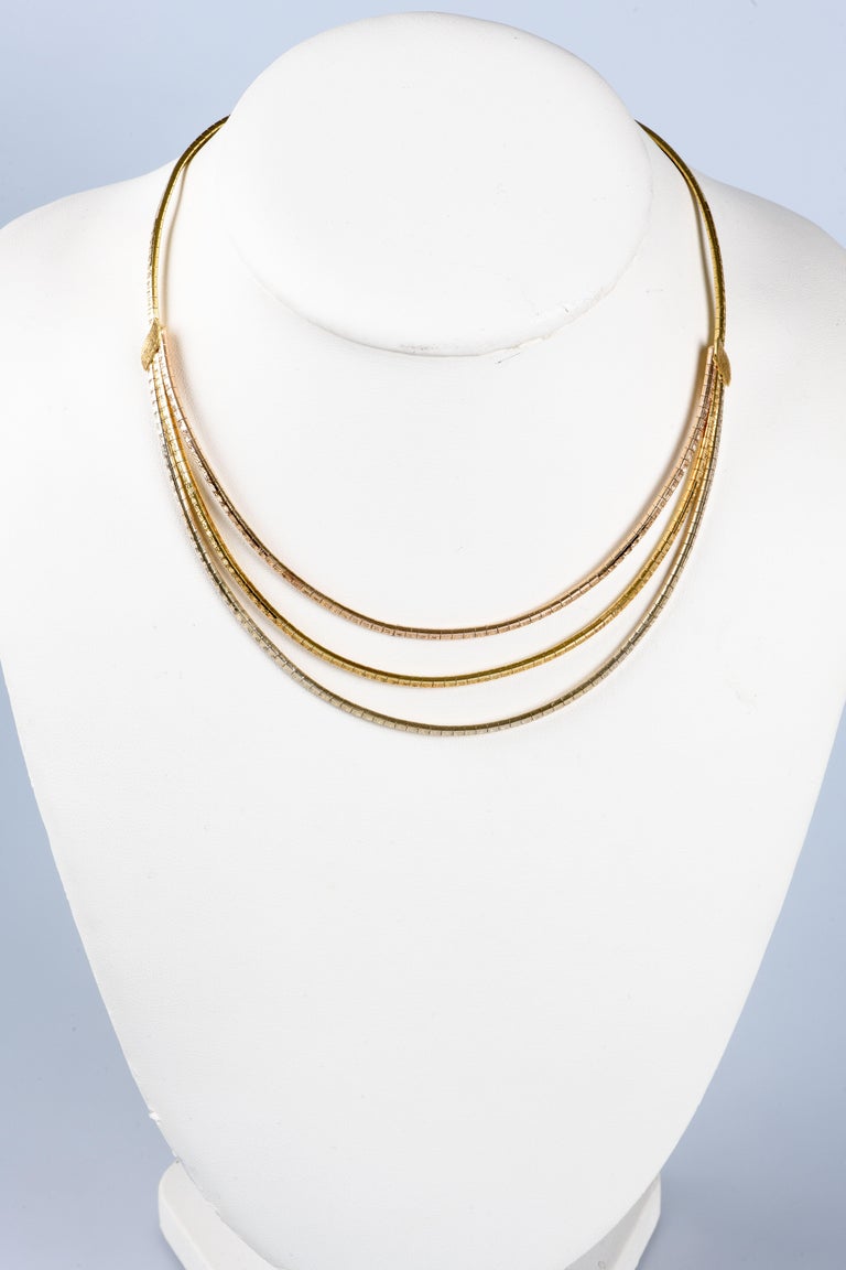 Three-row 750 gold necklace fully chiseled with yellow, white and rose ...