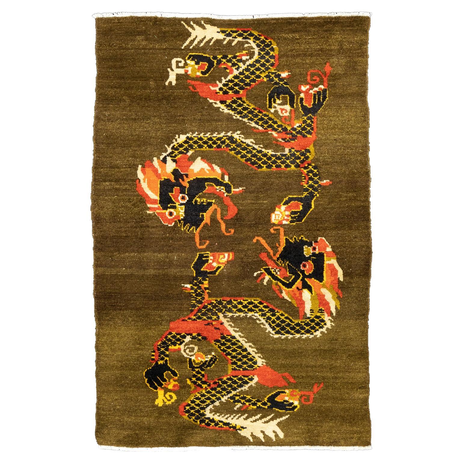 Charming Antique Tibetan Dragon Design Sitting Rug at 1stDibs