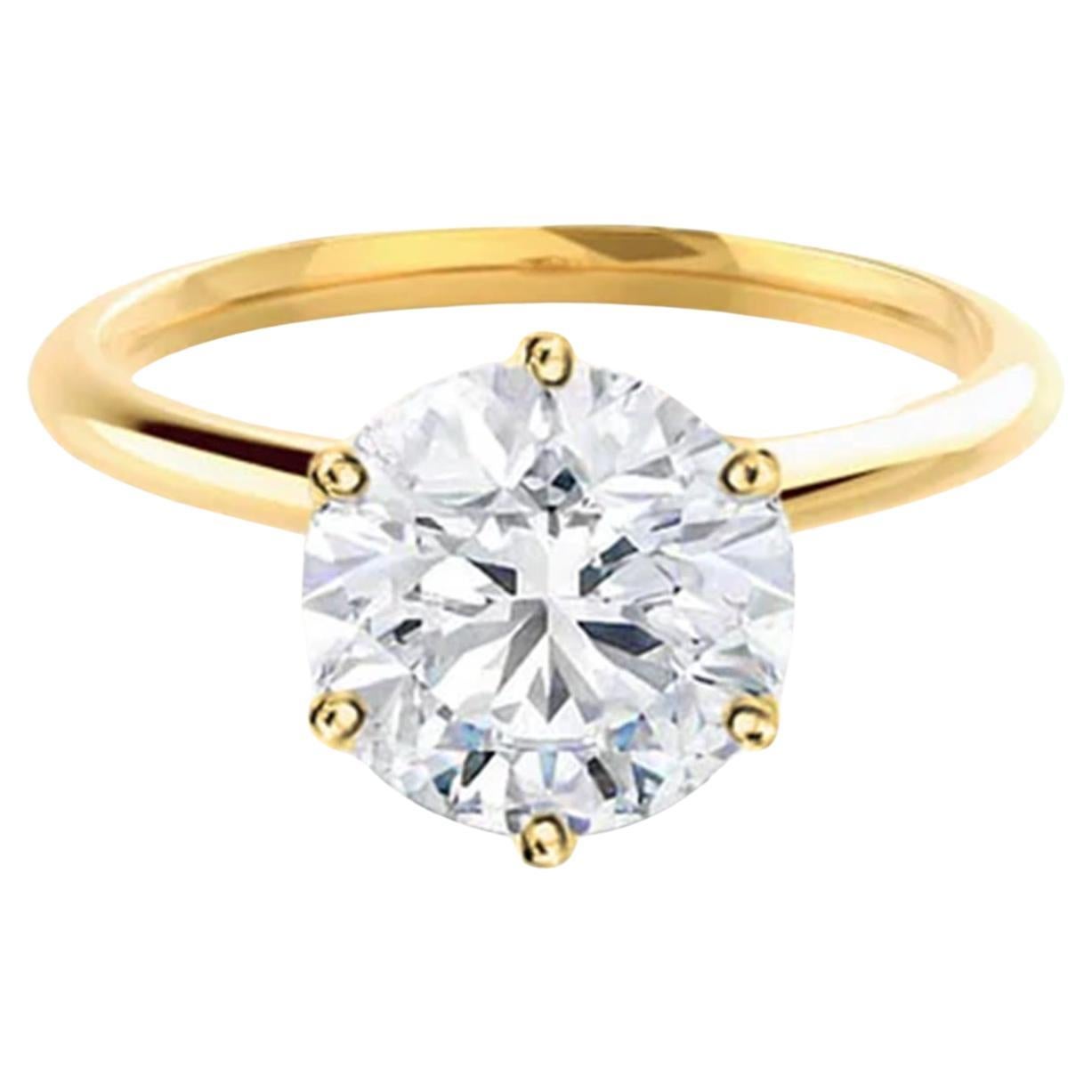 Tiffany and Co. 1.2 ct 18k Yellow Gold and Platinum Round Brilliant Diamond Ring For Sale at 1stDibs