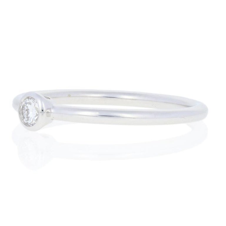 Tiffany and Co. .12 Carat Round Brilliant Diamond Bezet Ring, 18k Gold ...